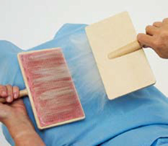 Six Steps to Hand Carding Wool – Mother Earth News